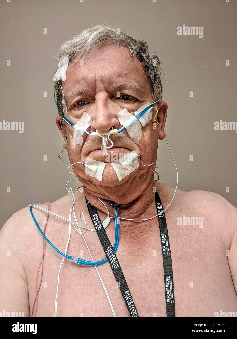 Man being tested for sleep apnea Stock Photo - Alamy