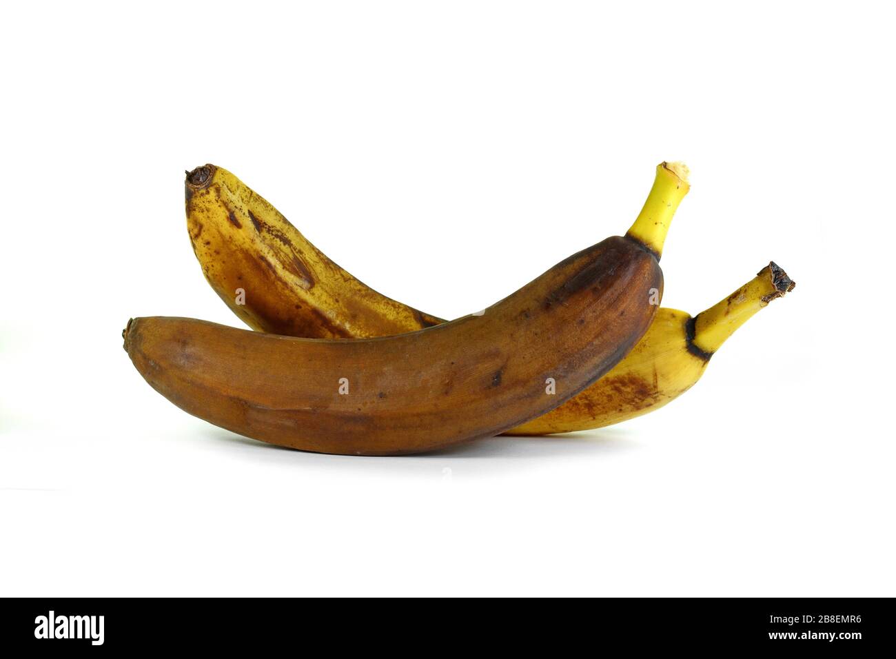 Overripe banana isolated on white background Stock Photo - Alamy