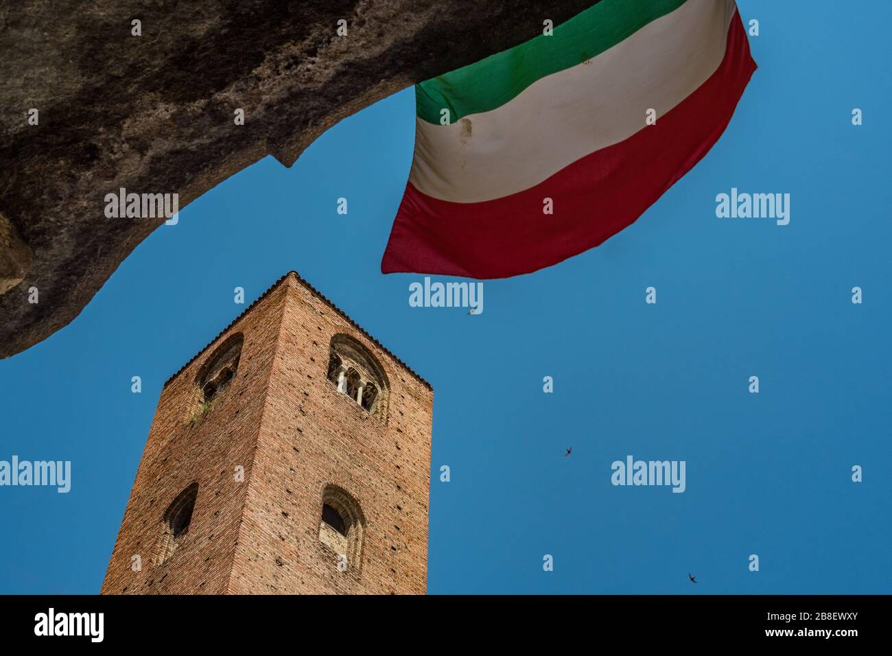 Italian flag hanging from the ceiling or a balcony Stock Photo - Alamy