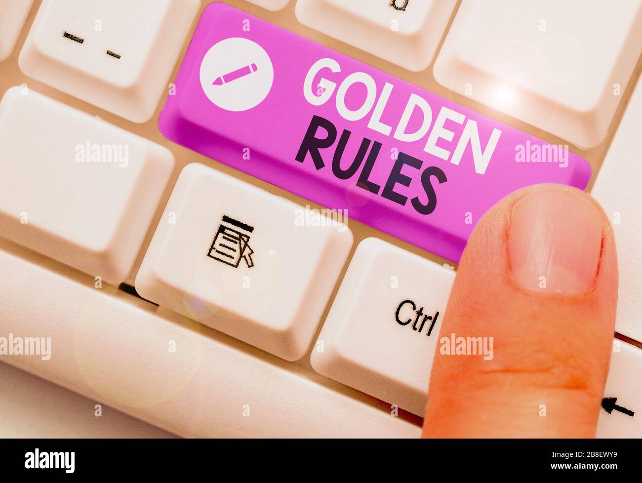Writing note showing Golden Rules. Business concept for basic principle ...