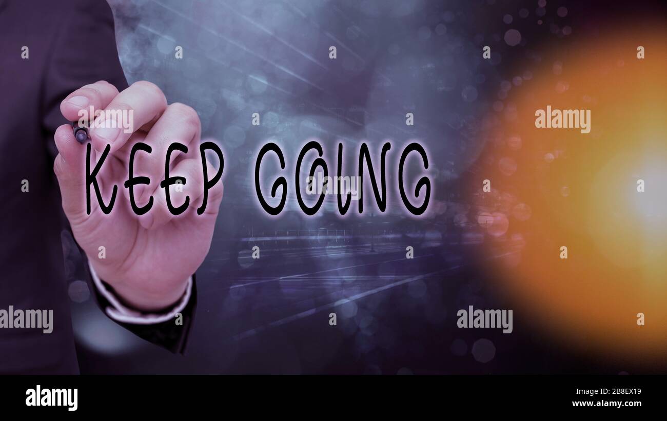 Conceptual hand writing showing Keep Going. Concept meaning make an ...