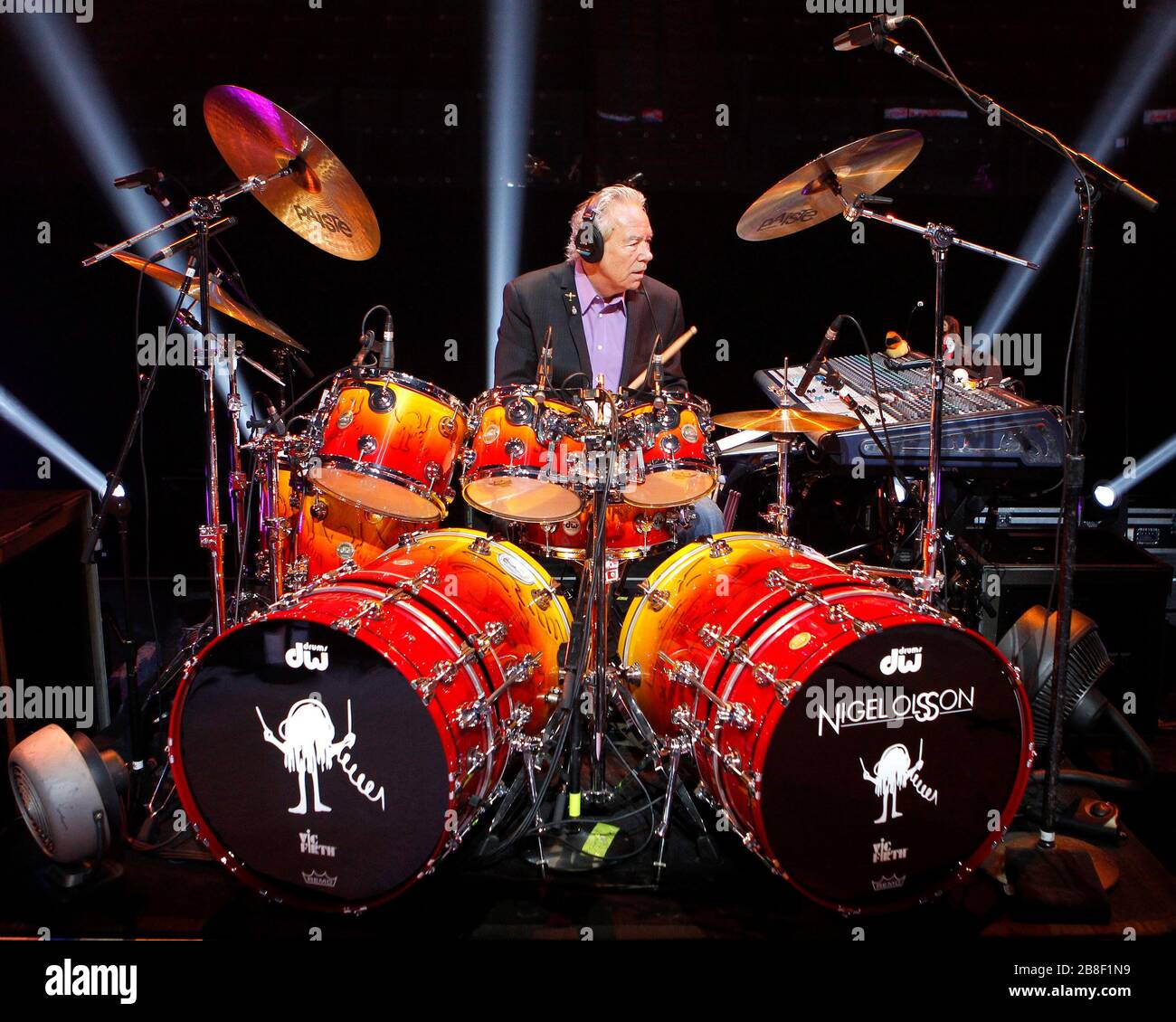 Drummer Nigel Olsson does a pre show photo shoot before he performs ...