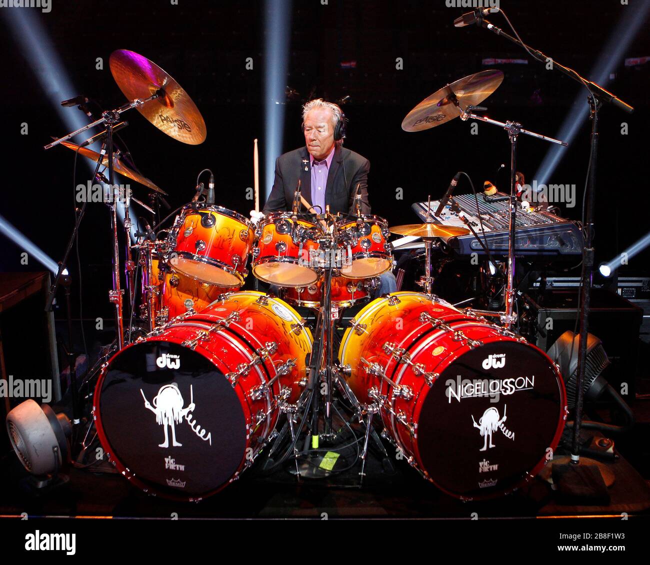 Drummer Nigel Olsson does a pre show photo shoot before he performs ...