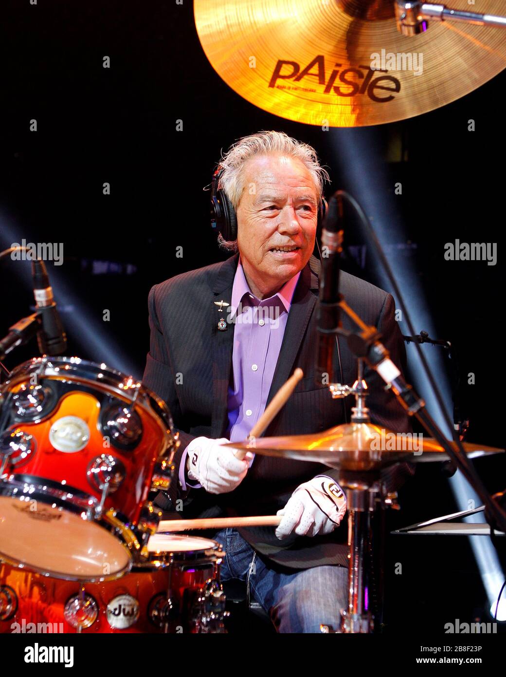 Drummer Nigel Olsson does a pre show photo shoot before he performs ...