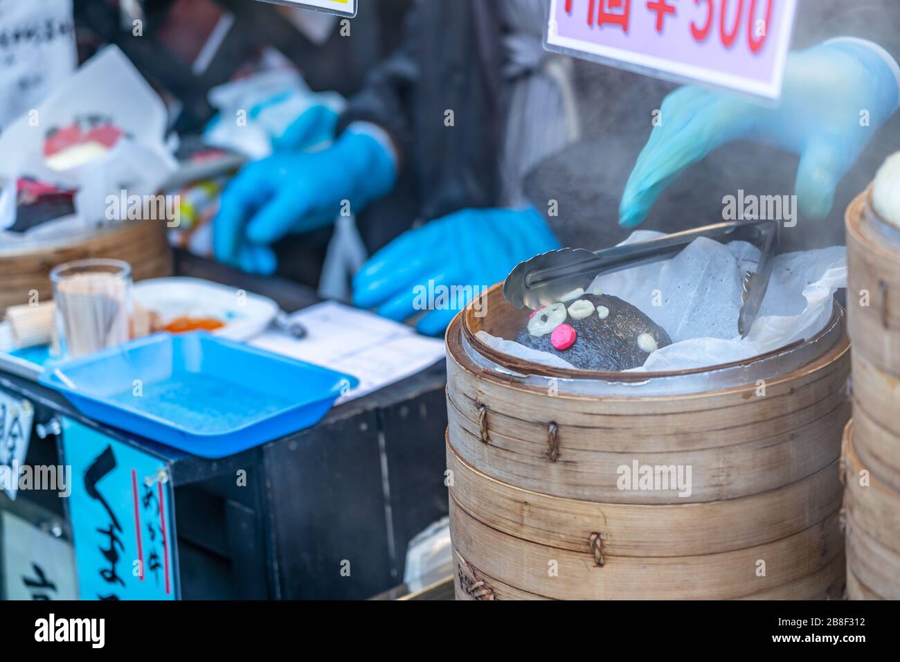 Kumamon steamed dumpling, a local food sell in Sakura-no-Baba Johsaien ...