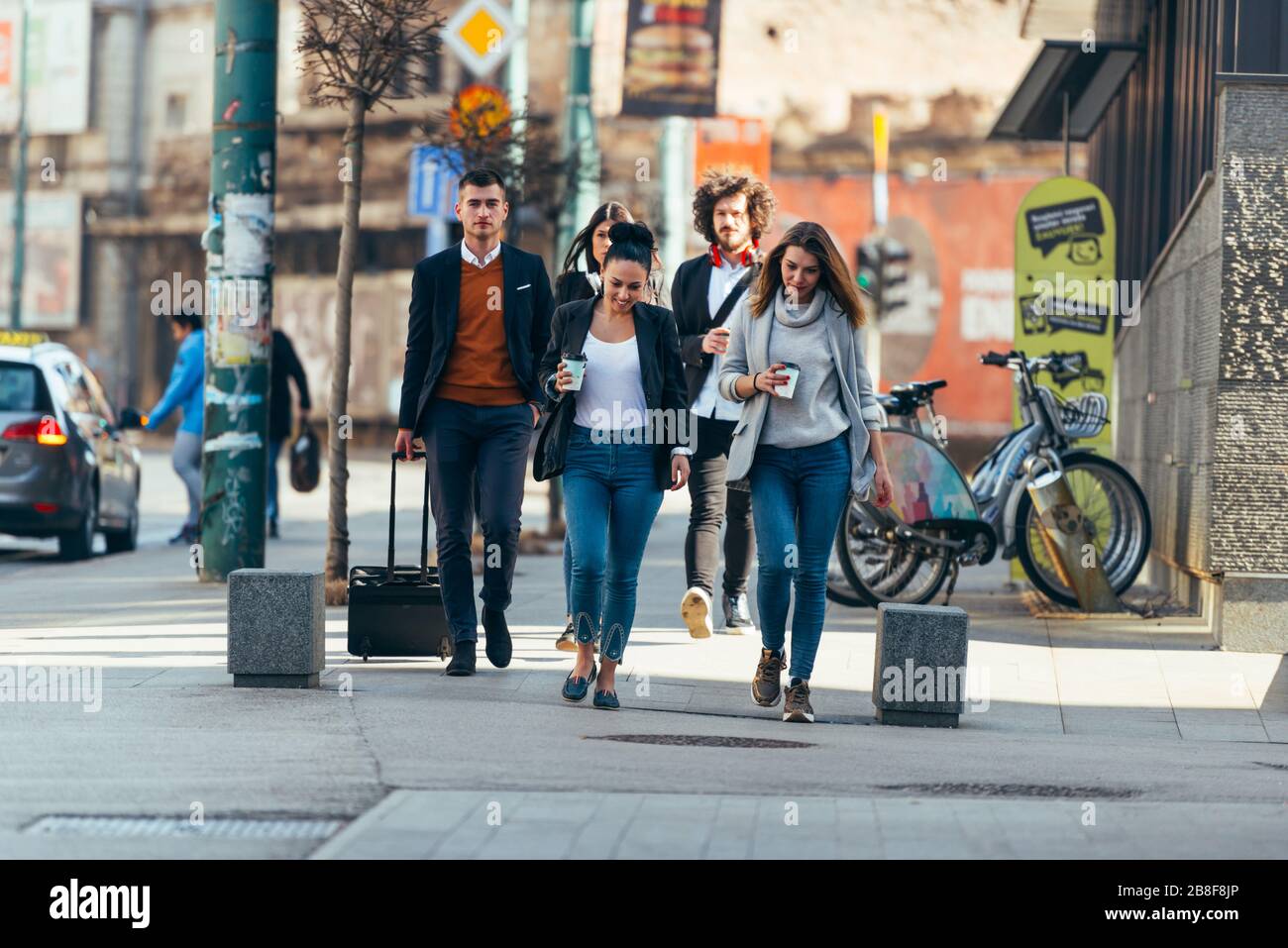 Friends Bonding, group of multi-ethnic friends walking on the streets ...