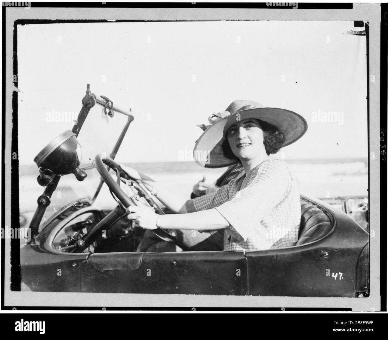 Girl in machine Stock Photo - Alamy