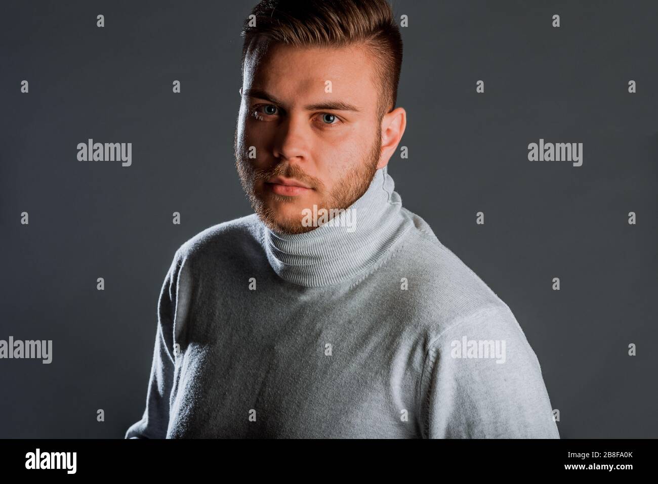 Studio body shot of a fashion male model wearing stylish clothes Stock ...