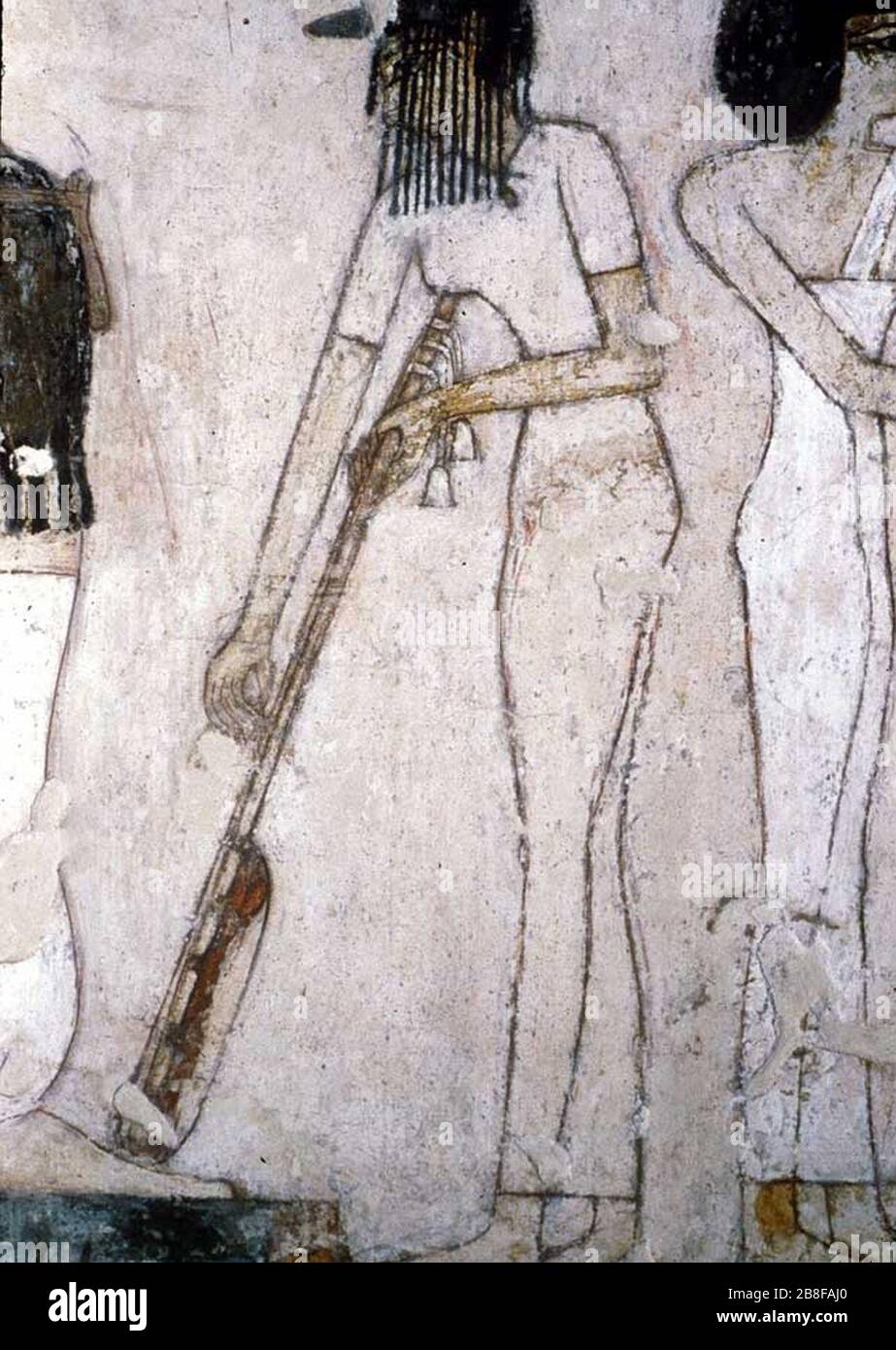 Girl tuning Egyptian lute at Rekhmire Stock Photo - Alamy