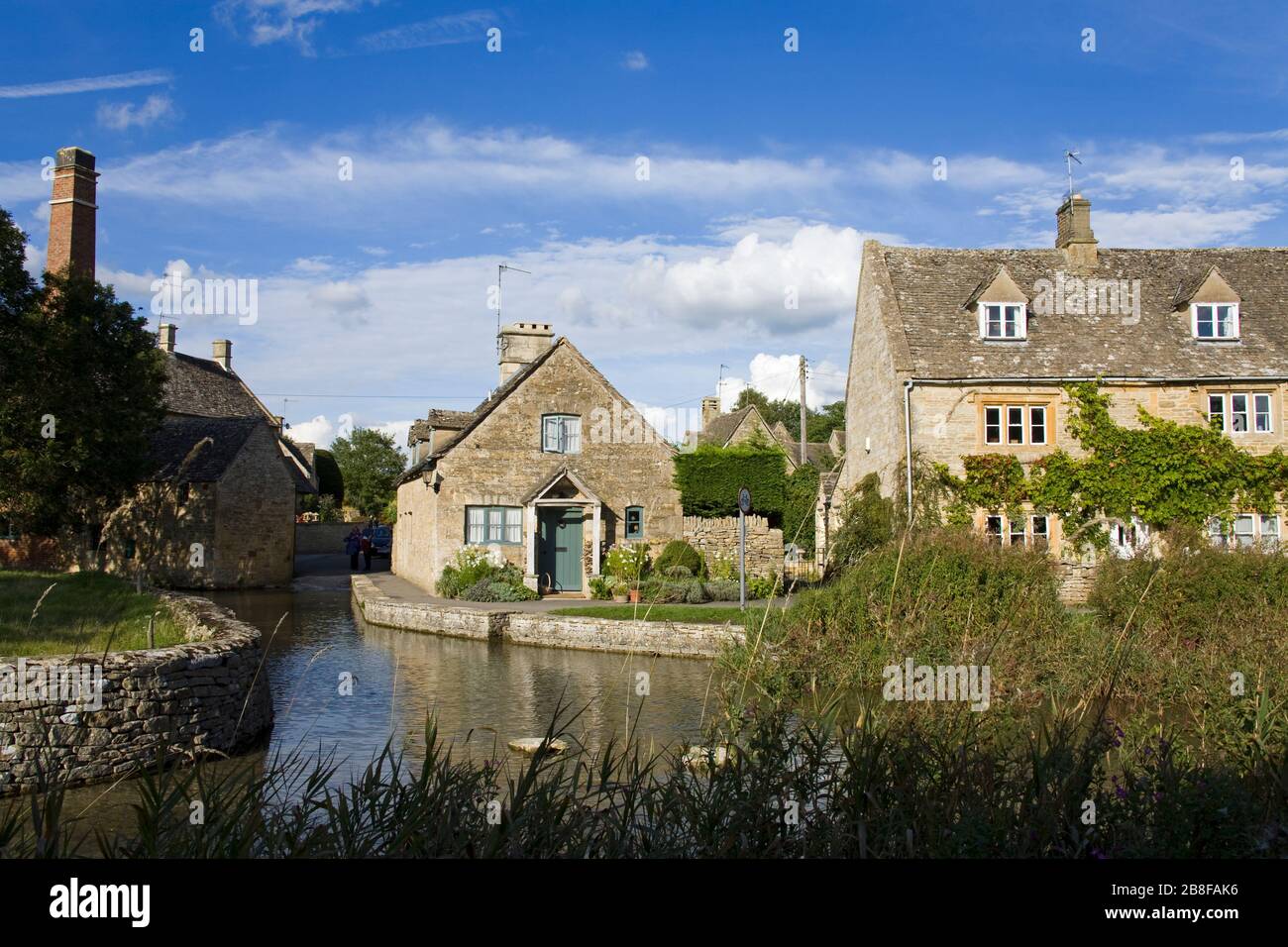 Little Eye stream in Lower Slaughter Village, Gloucestershire, Cotswold ...