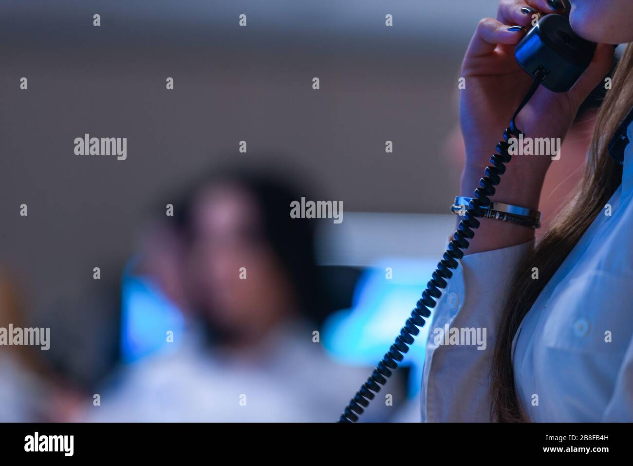 Technical Operator Works at His Workstation with Multiple Displays ...