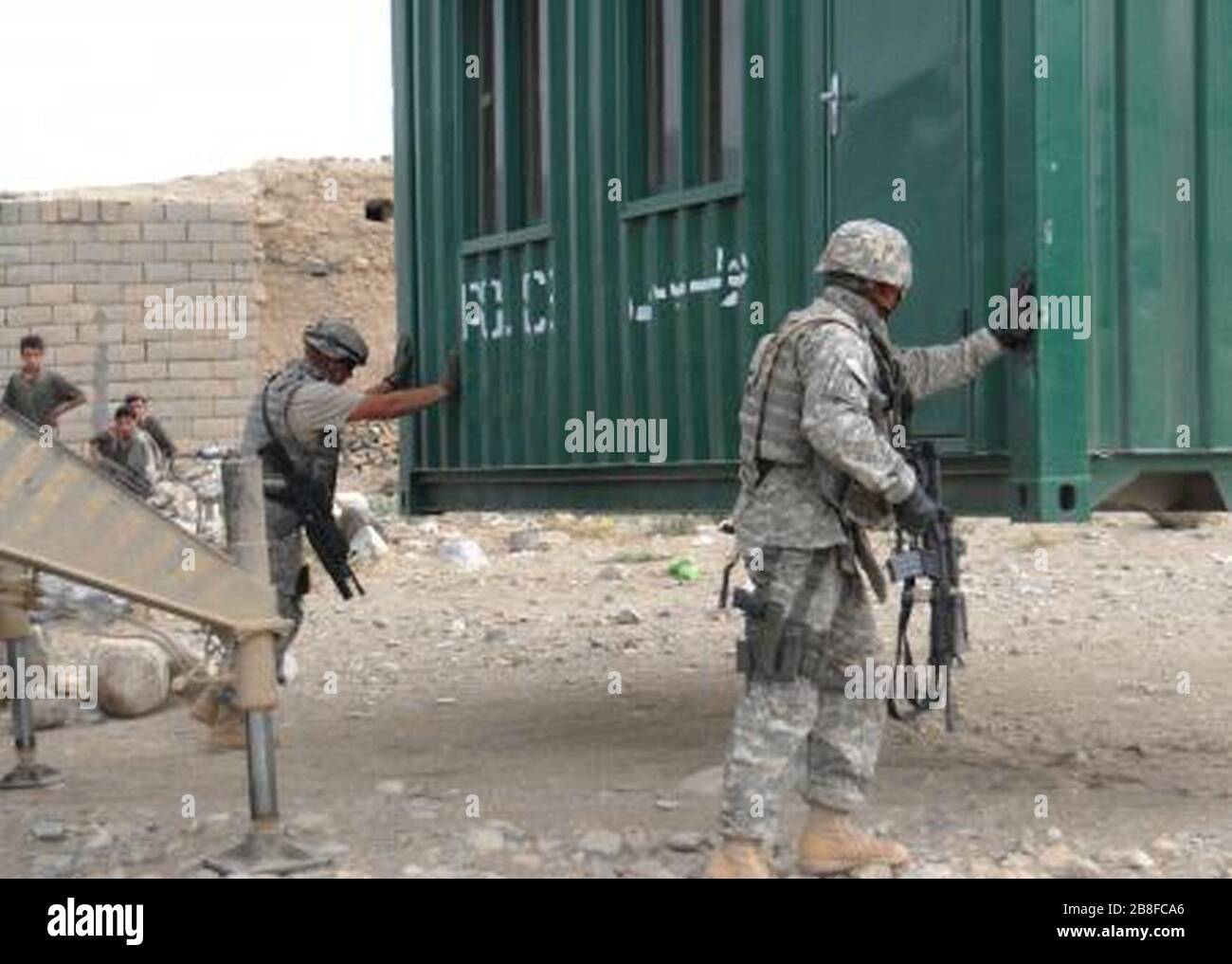 GIs place a portable police checkpoint in the Tag Ab Valley Kapisa -a ...