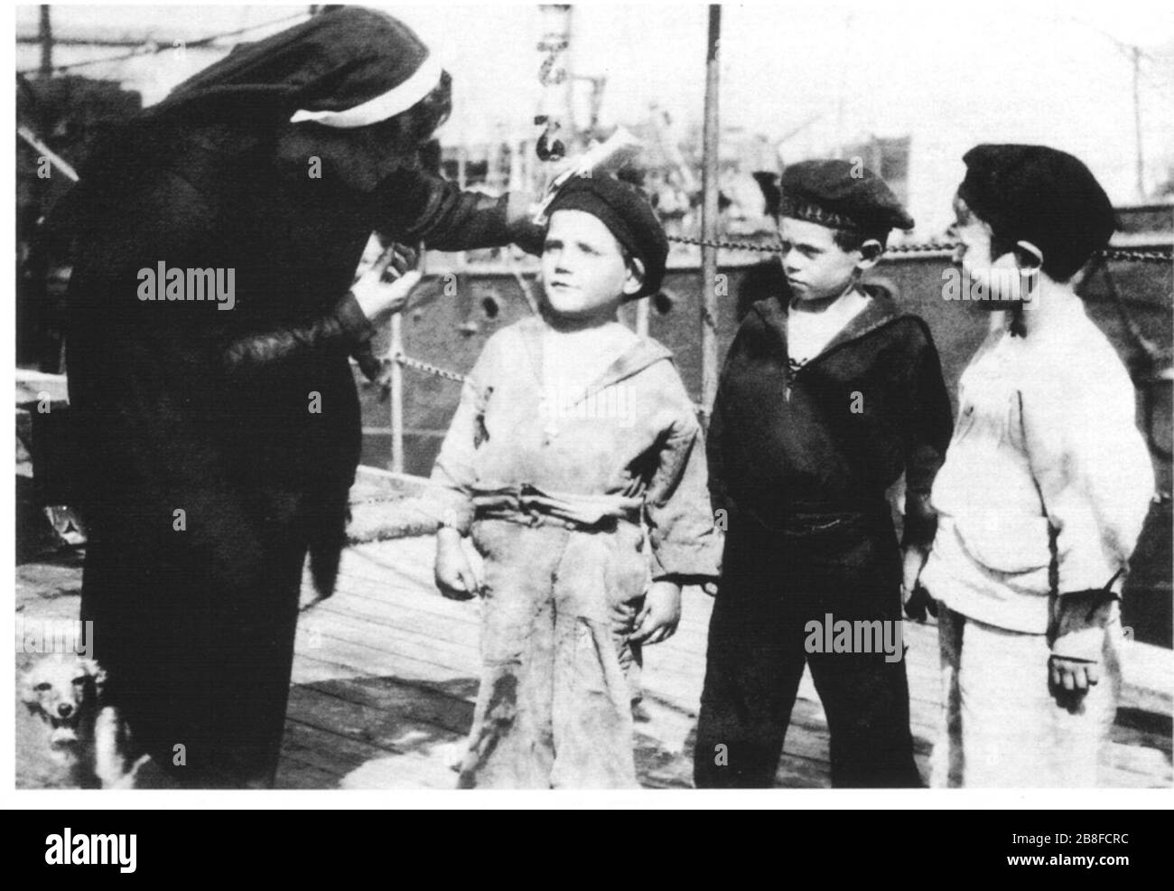 Giulia Civita Franceschi with three boys on the kindergarten ship ...