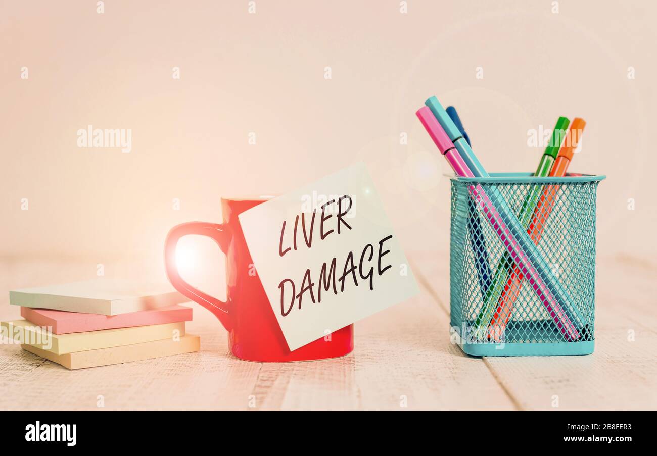 Handwriting text writing Liver Damage. Conceptual photo damage to the ...