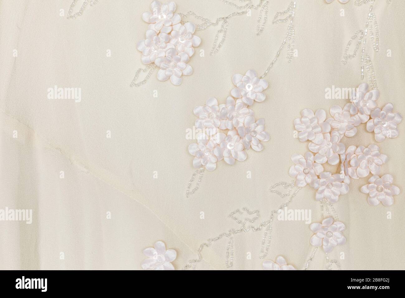 Ivory wedding fabric with flower and beaded background texture Stock ...