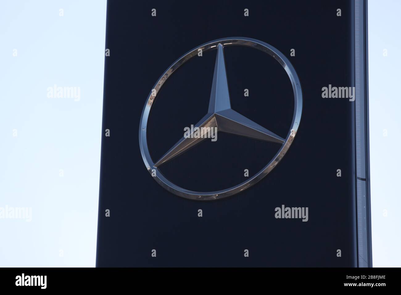 A logo of a Mercedes-Benz is seen at the dealer Stock Photo - Alamy