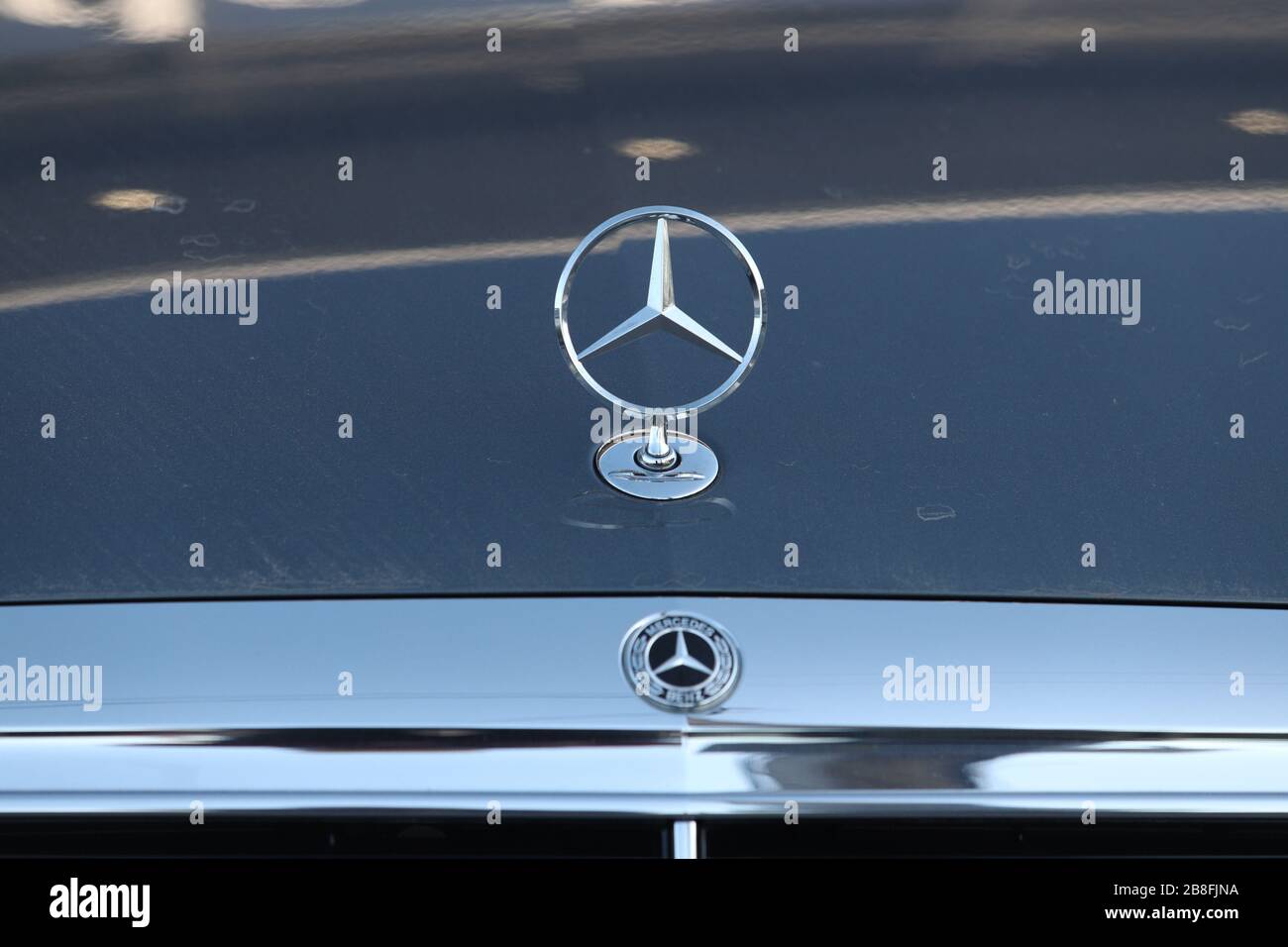 Mercedes-Benz logo seen on a car Stock Photo - Alamy