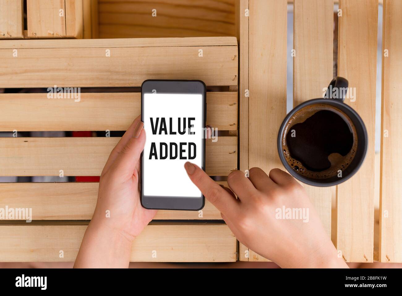 Handwriting text Value Added. Conceptual photo the extra value created ...