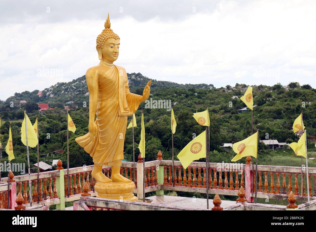 Golden Buddha Statue stand, Buddha gold in temple Stock Photo - Alamy