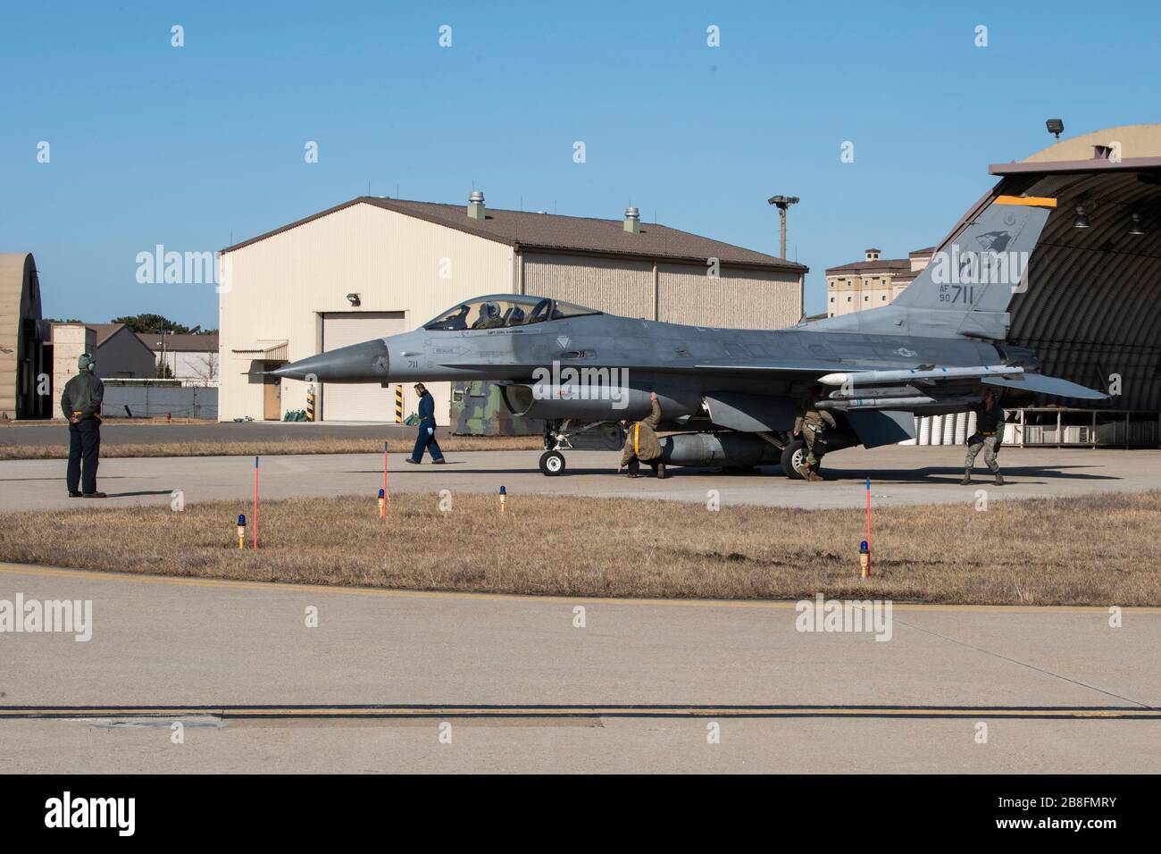 U.S. Air Force Airmen, assigned to the 8th Fighter Wing, perform ...
