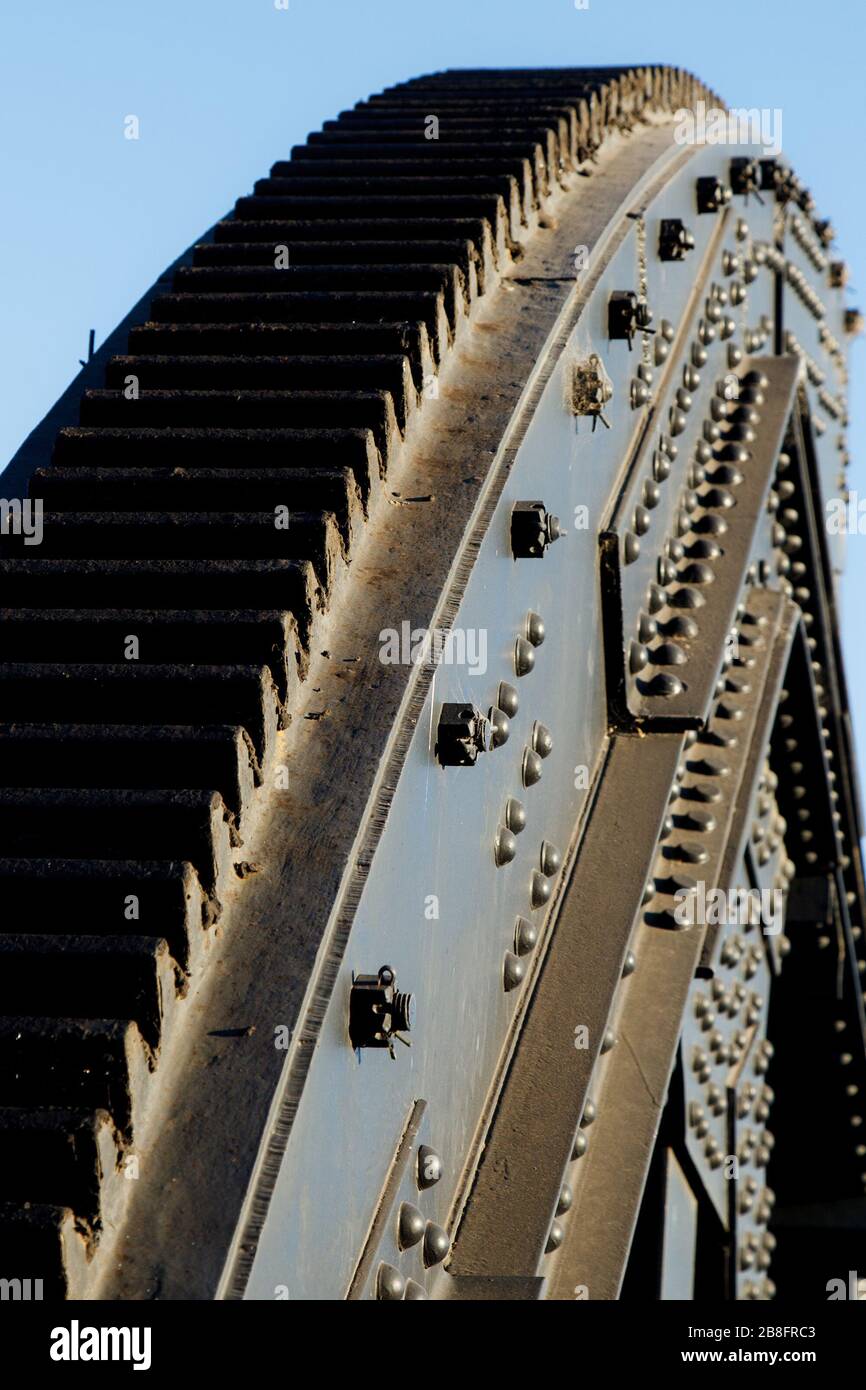 Gear Teeth on Bridge, with Rivets and Bolts Stock Photo - Alamy