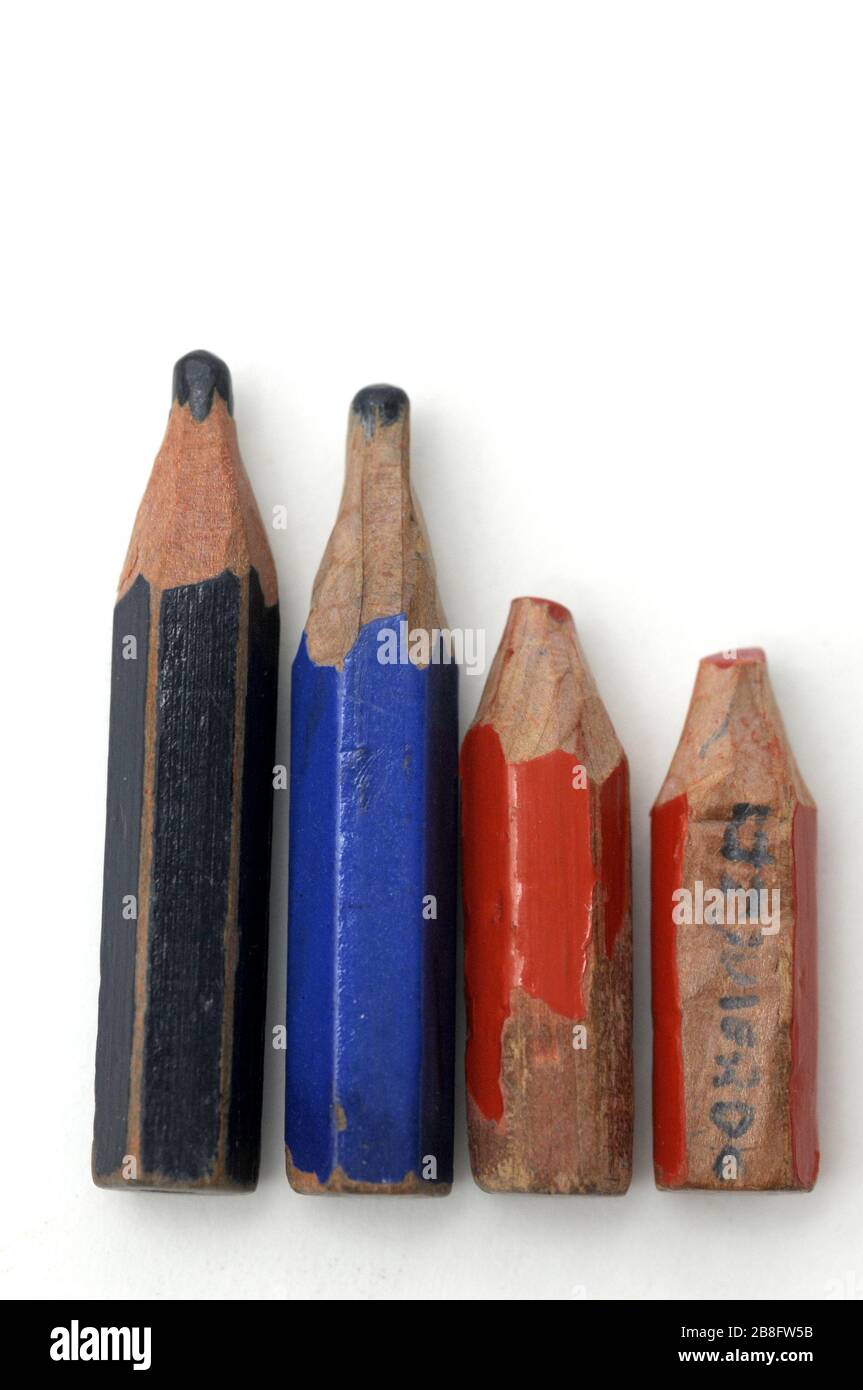 four really used pencils Stock Photo - Alamy