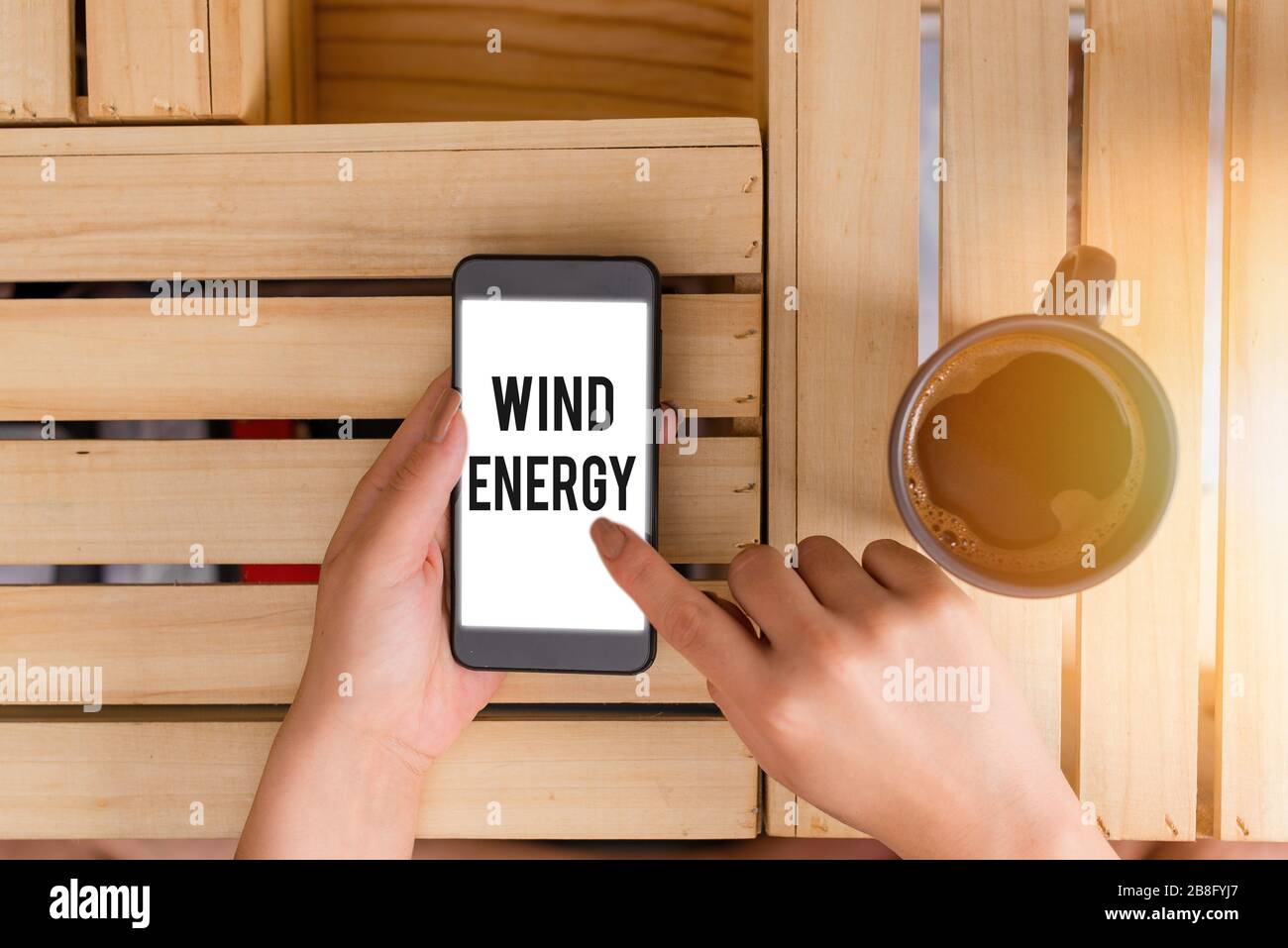 Handwriting text Wind Energy. Conceptual photo the process by which ...