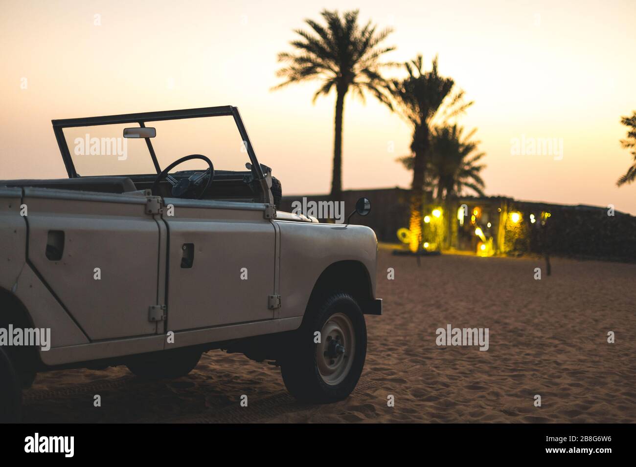 Bedouin camp with Land Rover in the foreground in the desert of Dubai ...