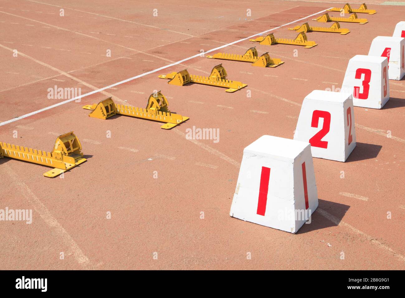 The starting blocks are on the track in the playground Stock Photo - Alamy
