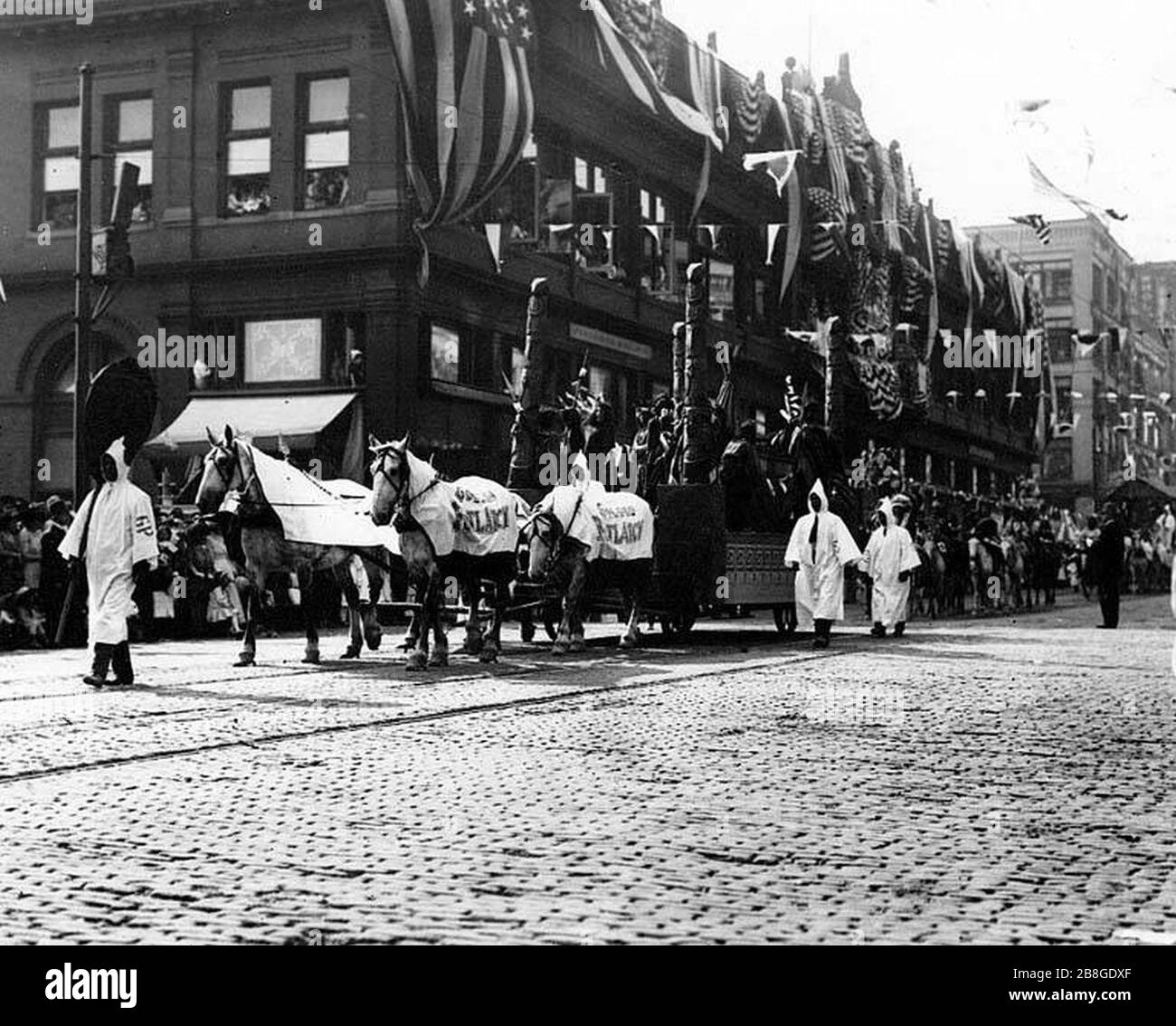 Golden Potlatch Parade, Seattle, float with totem poles (CURTIS 1008 ...