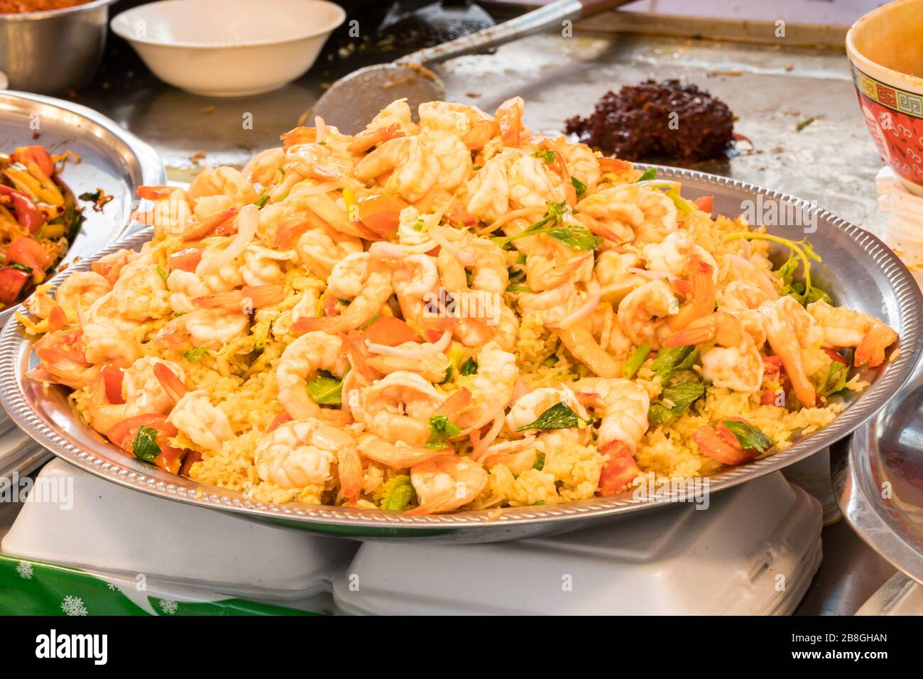Plate of cooked prawns and rice Stock Photo - Alamy