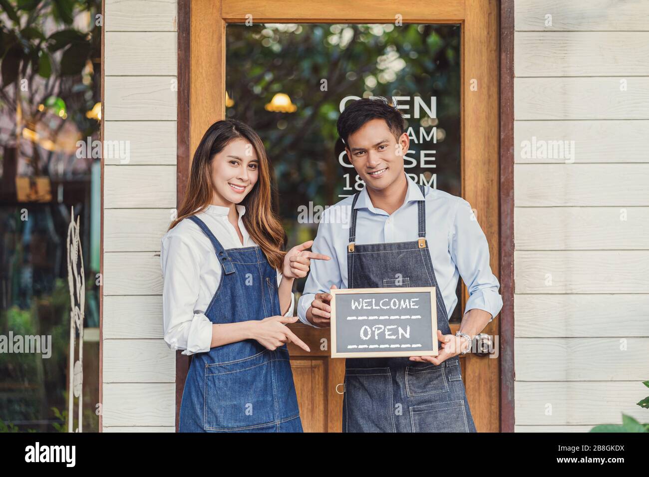 Closeup Asian partner Small business owner hands holding and showing ...