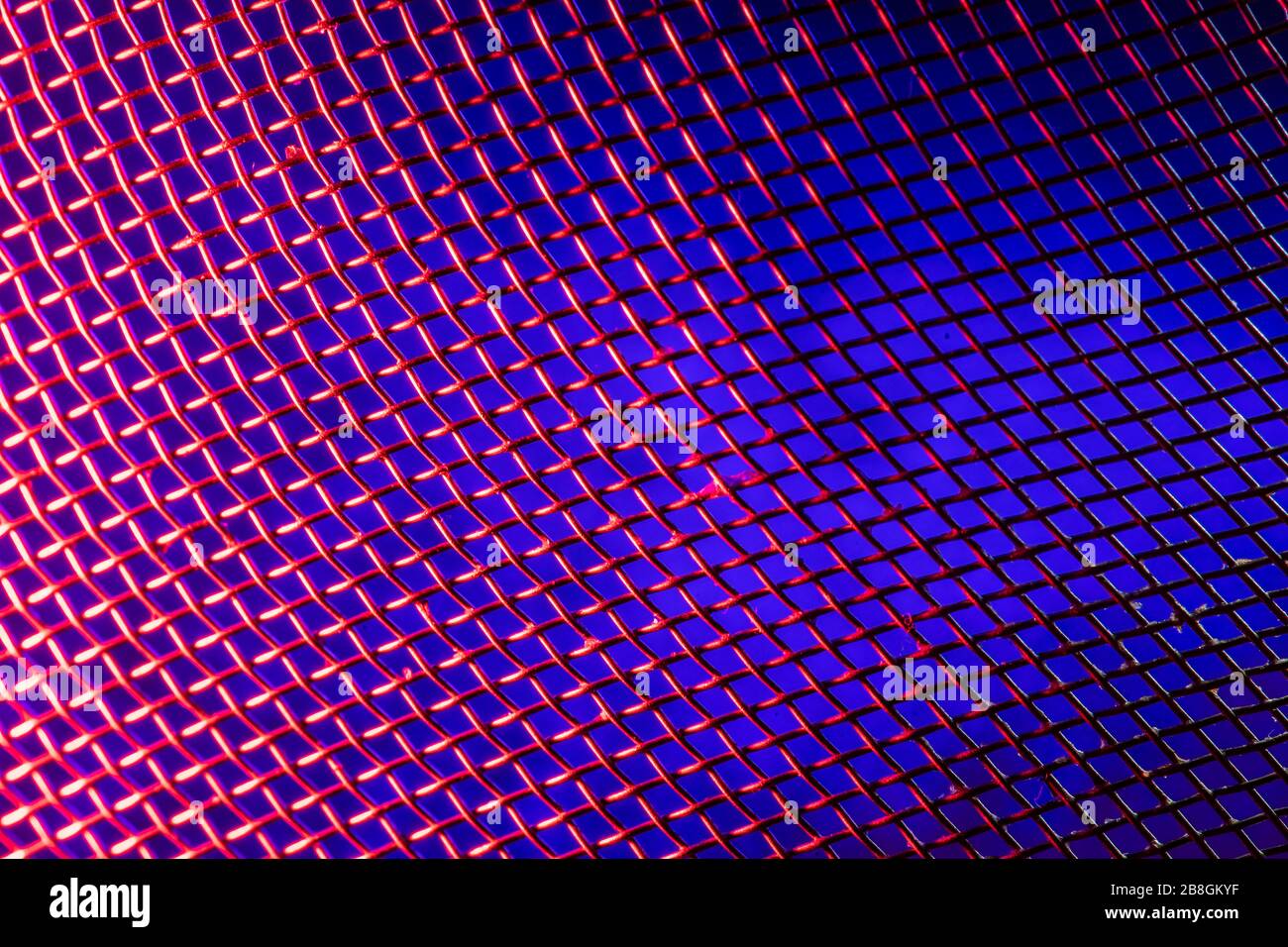 Macro image, blue lit light, metal mesh Stock Photo - Alamy