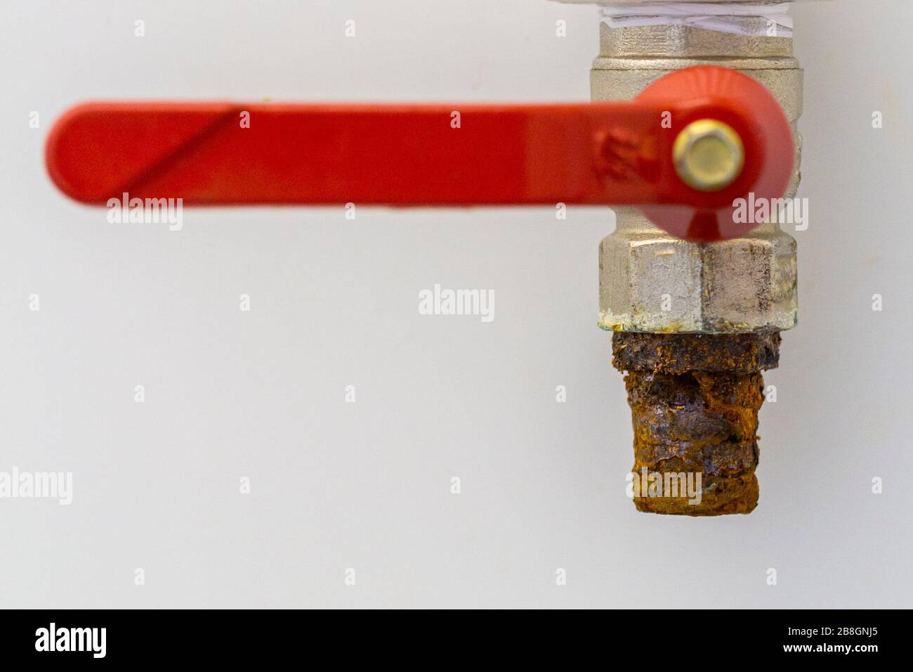 Exterior rusty tap isolated on white wall background Stock Photo - Alamy