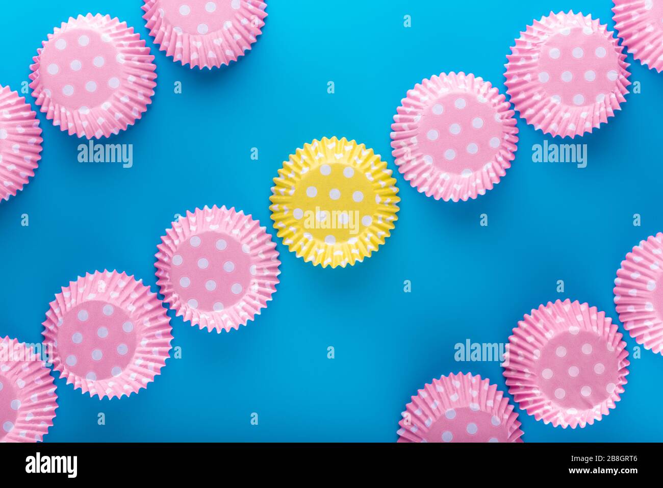 Muffin cases. Cake cases. Top View. Flat laying. Blue background. Flat ...