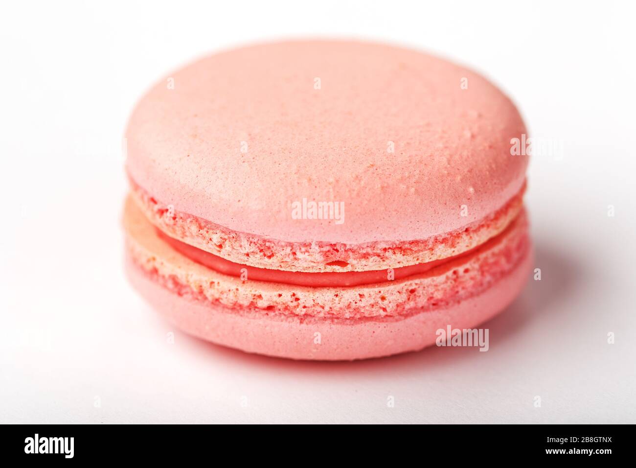 Pink macaroni Cookies on a white background, isolated Stock Photo - Alamy