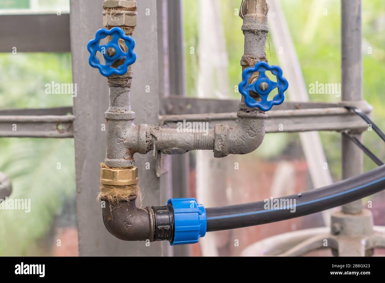 valves and pipes system closeup Stock Photo - Alamy