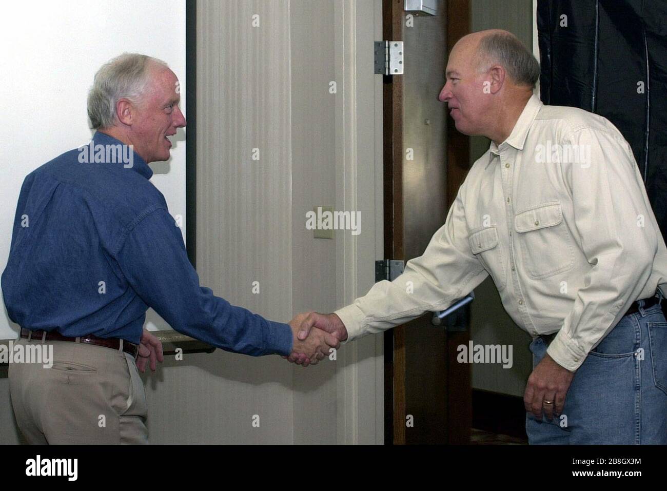 Governor Frank Keating shakes hands with Colonel Harry M. ‘Buddy‘ Wyatt ...