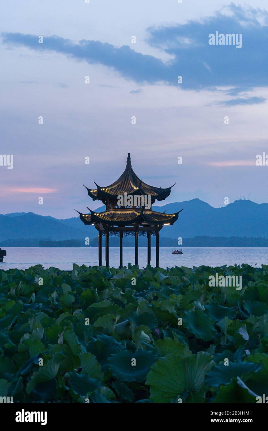 Jixian pavilion during sunrise in Hangzhou Stock Photo - Alamy