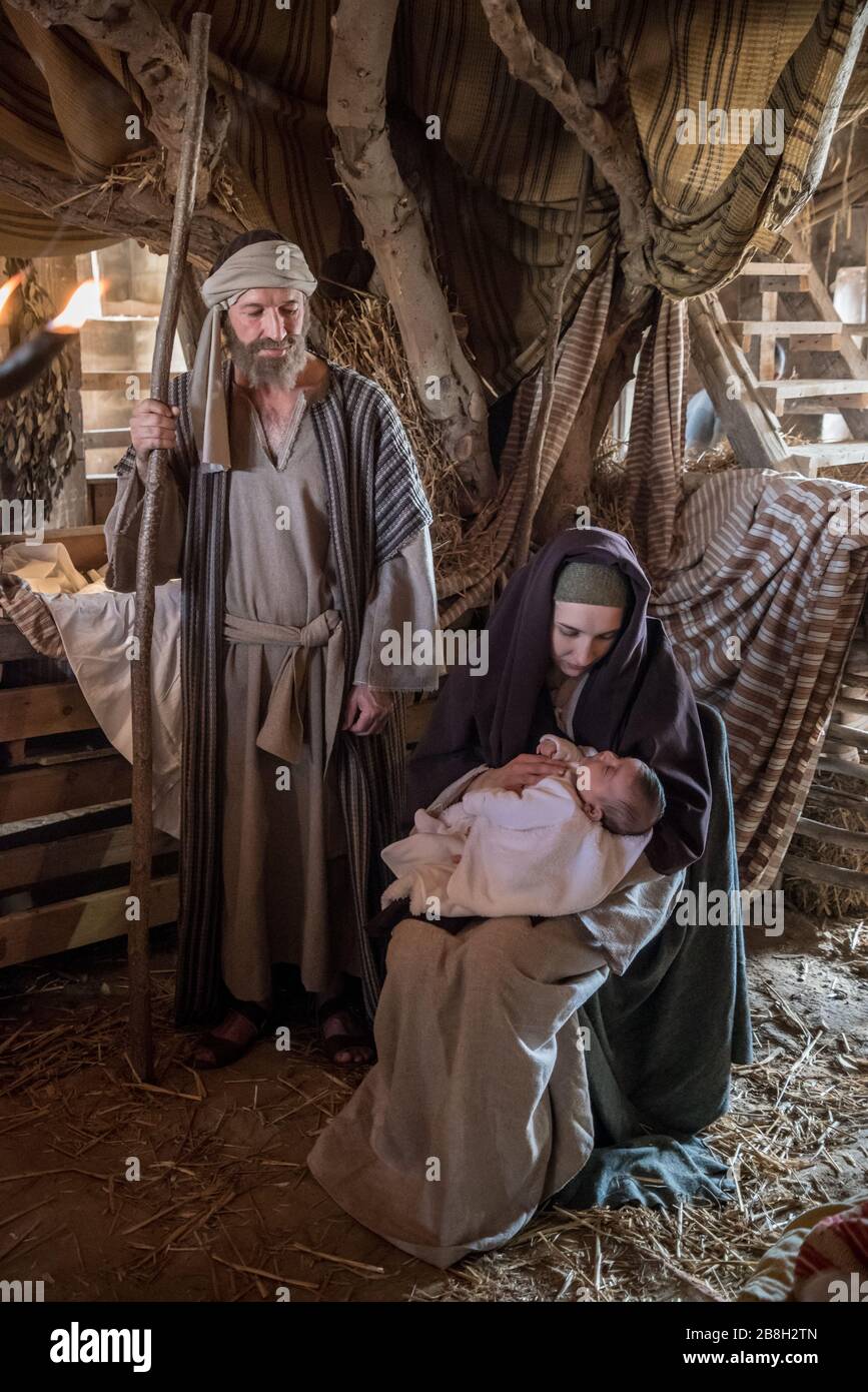 Live Nativity Scene with Saint Joseph, Saint Mary and Baby Jesus Stock ...