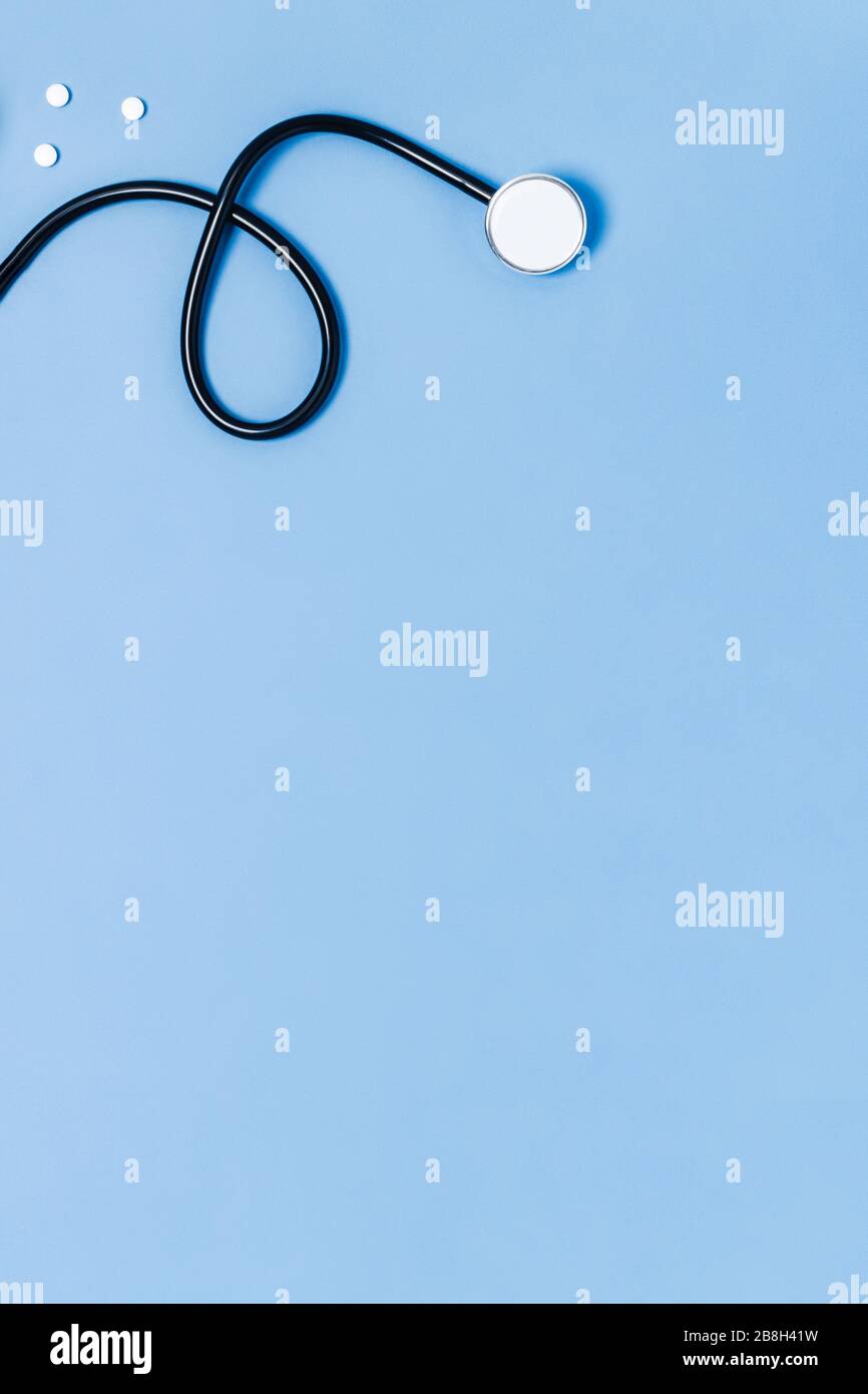 Medical vertical blue background with stethoscope and tablets Stock ...