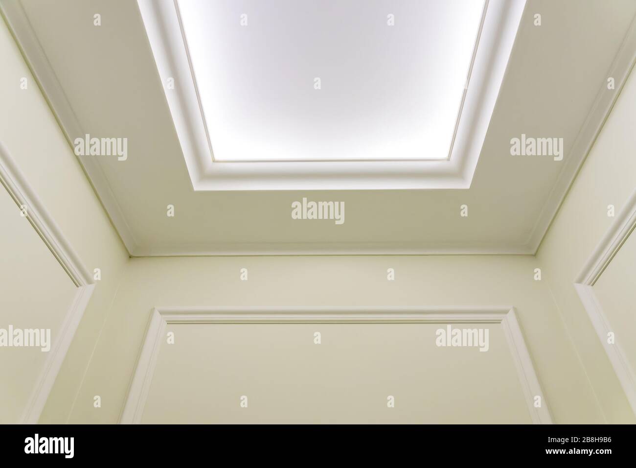 Modern layered ceiling with lights, classic style Stock Photo - Alamy