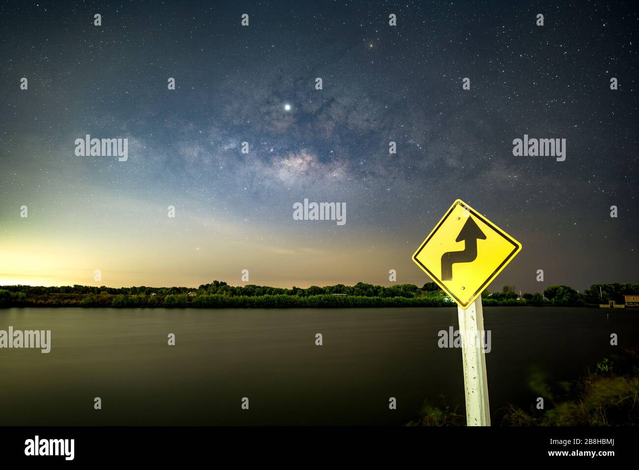 Signs, signs, beware of curves at night, behind the sign, with the ...