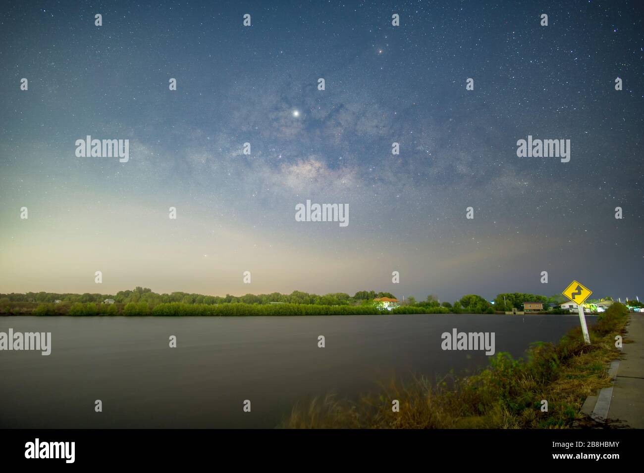 Signs, signs, beware of curves at night, behind the sign, with the ...