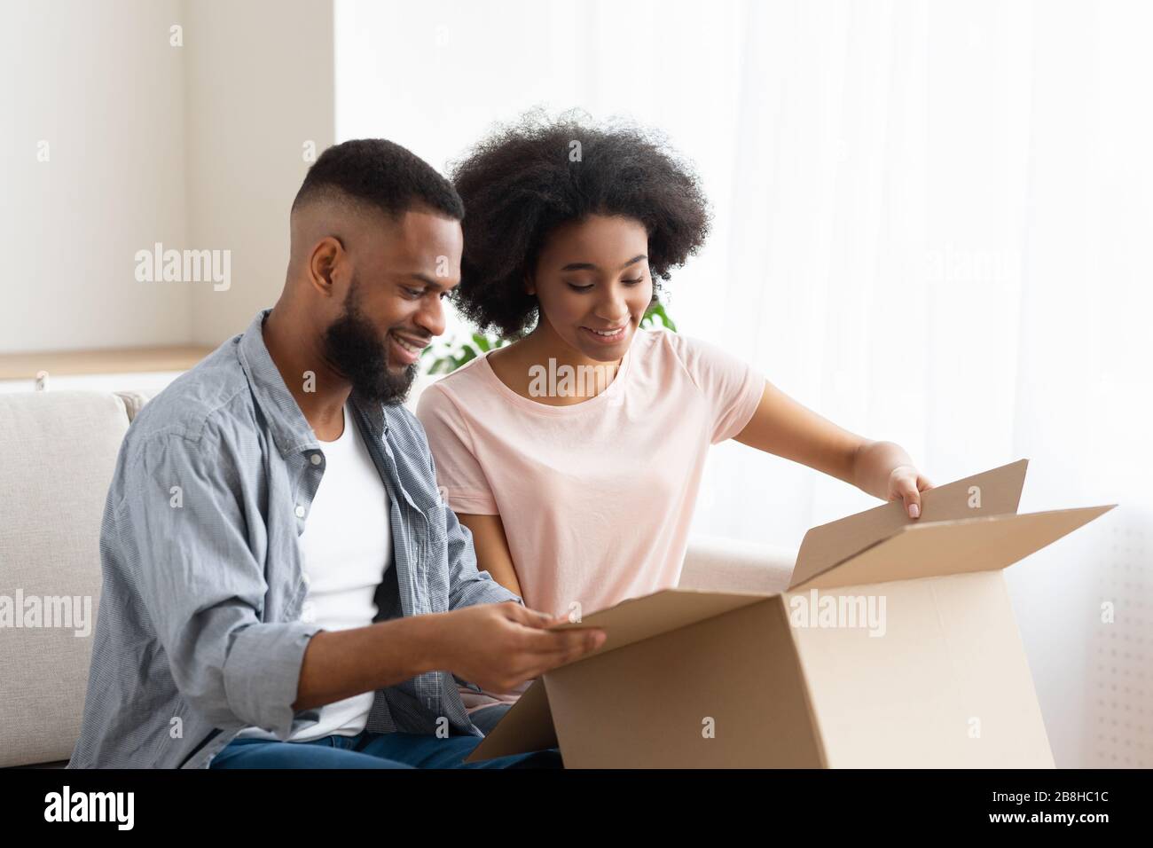 Unbox package hi-res stock photography and images - Alamy