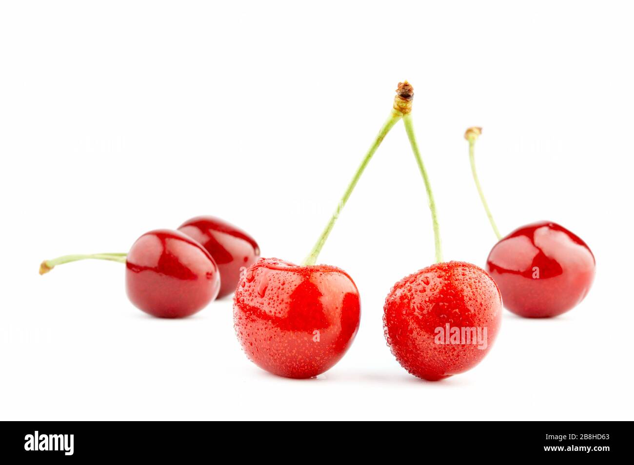Sweet Cherry isolated on white background with drops of water & soft ...