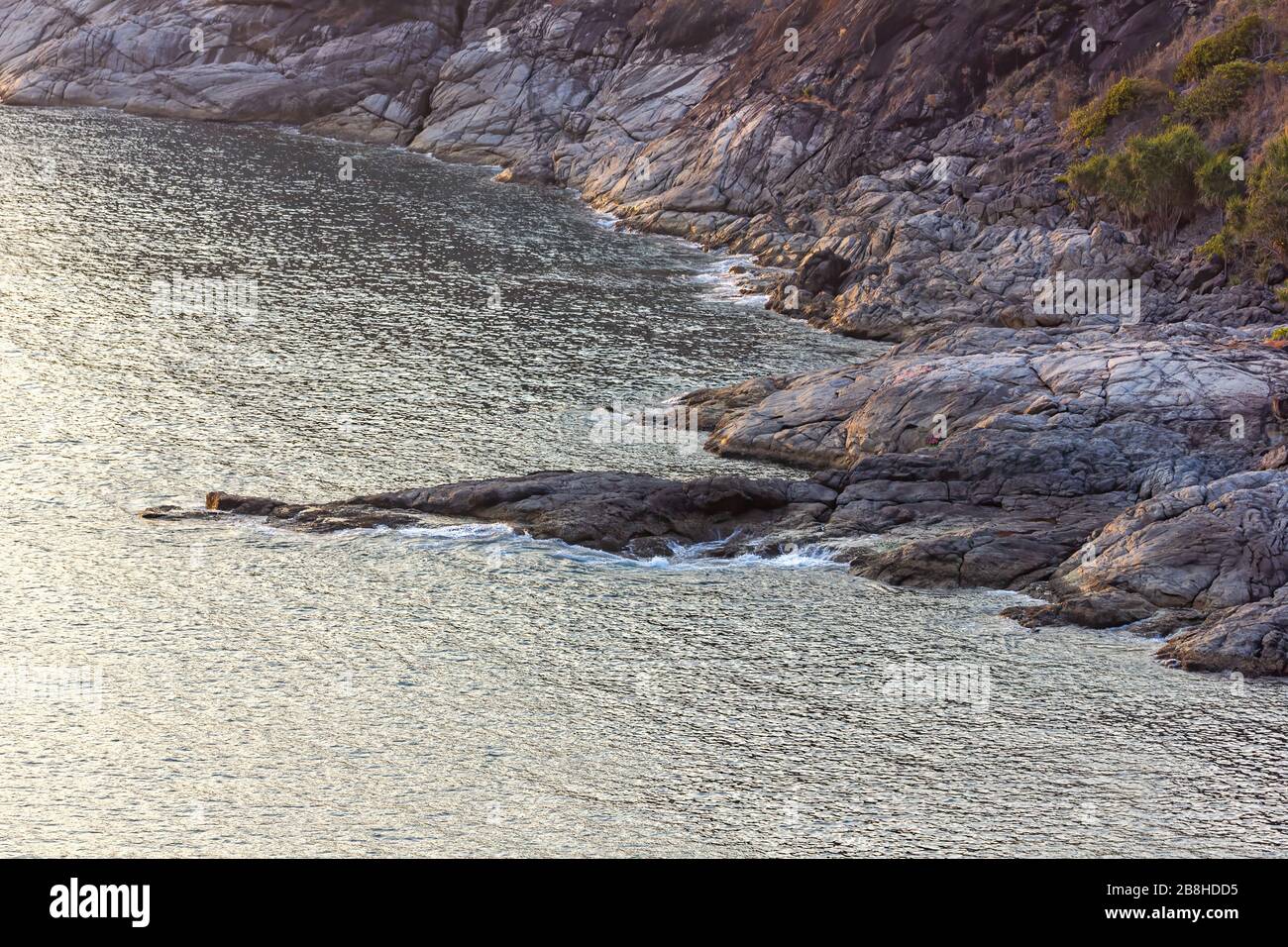 Rocks formed by limestone standing into the sea Stock Photo - Alamy