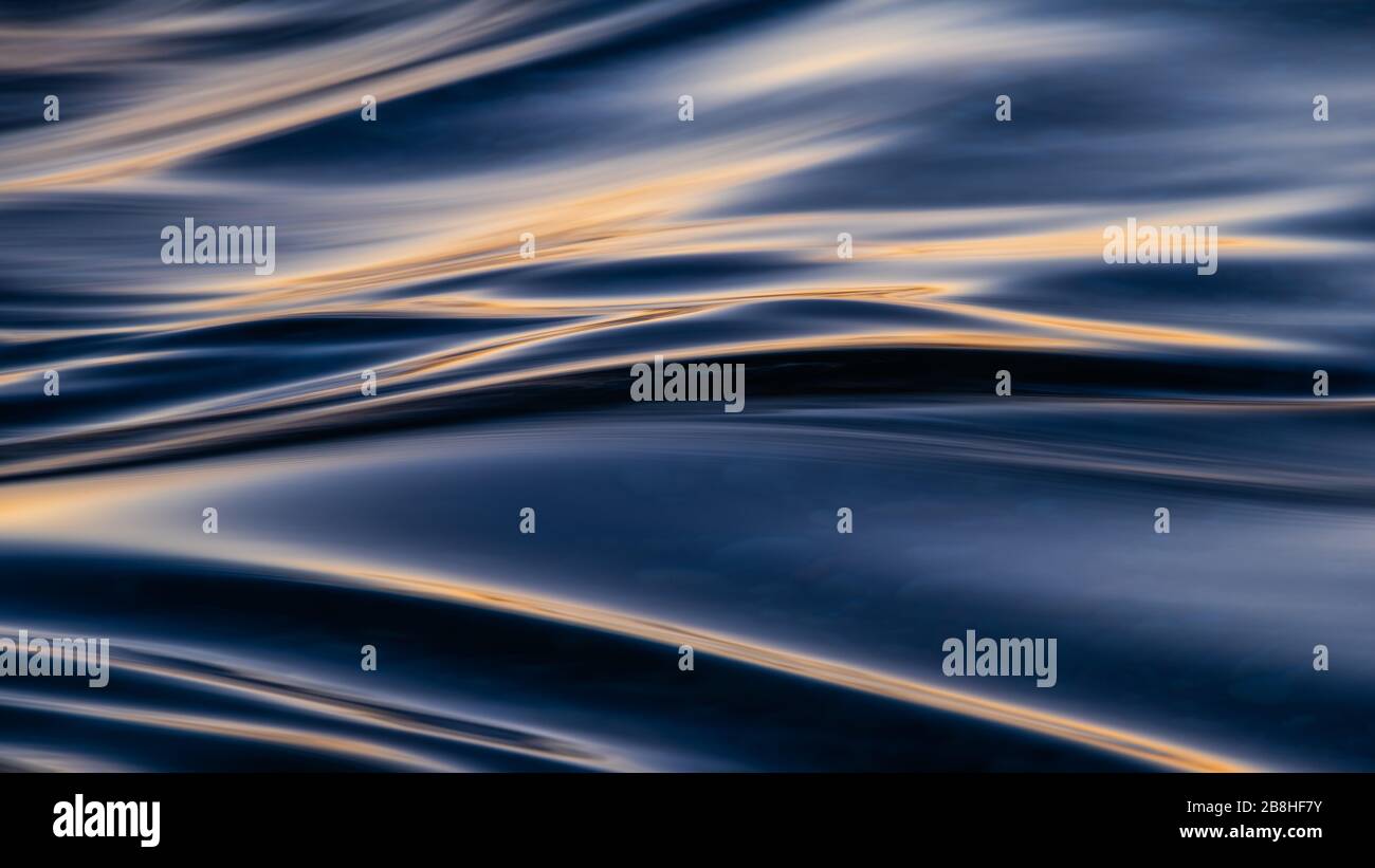 river water waves with sunlight reflections Stock Photo - Alamy