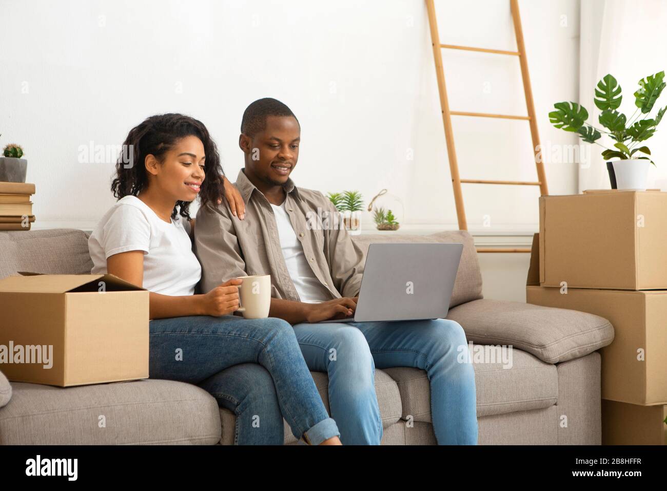 Sitting man sitting on boxes hi-res stock photography and images - Alamy