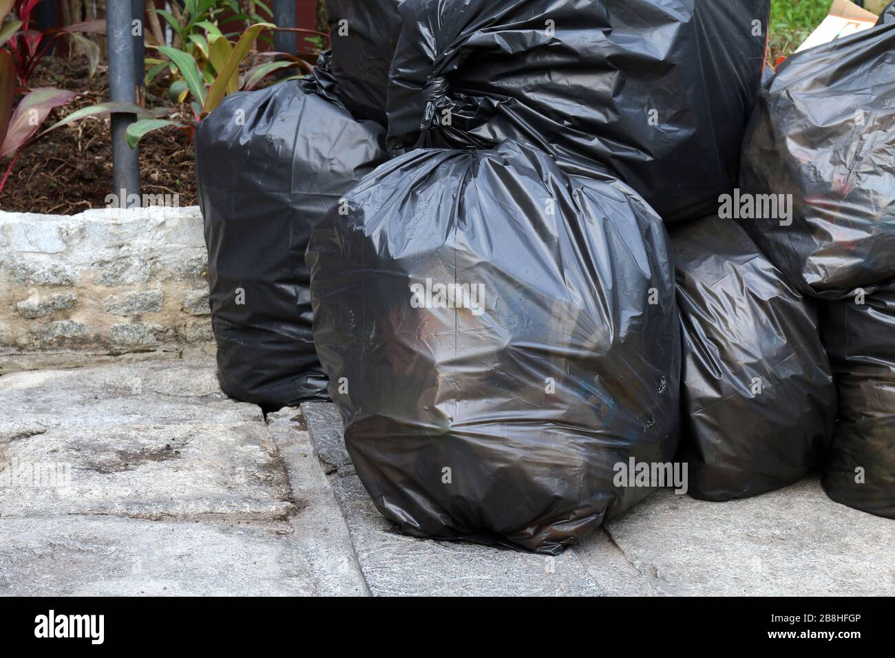 Waste plastic, Lots pile of garbage black bags stack on the floor ...